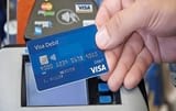 How do I register for a debit card?