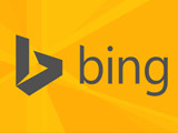 Microsoft introduces Bing Spotlight feature, showcasing news highlights.