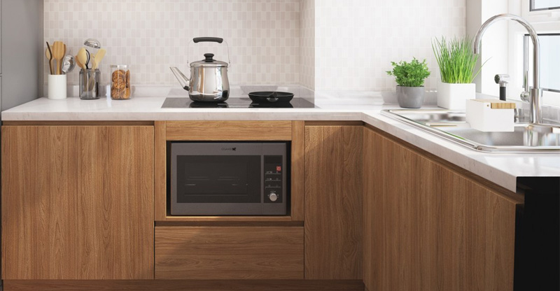Should you place the microwave under the induction cooker?
