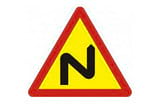 Numerous warning signs for sharp turns ahead W.202a, W.202b