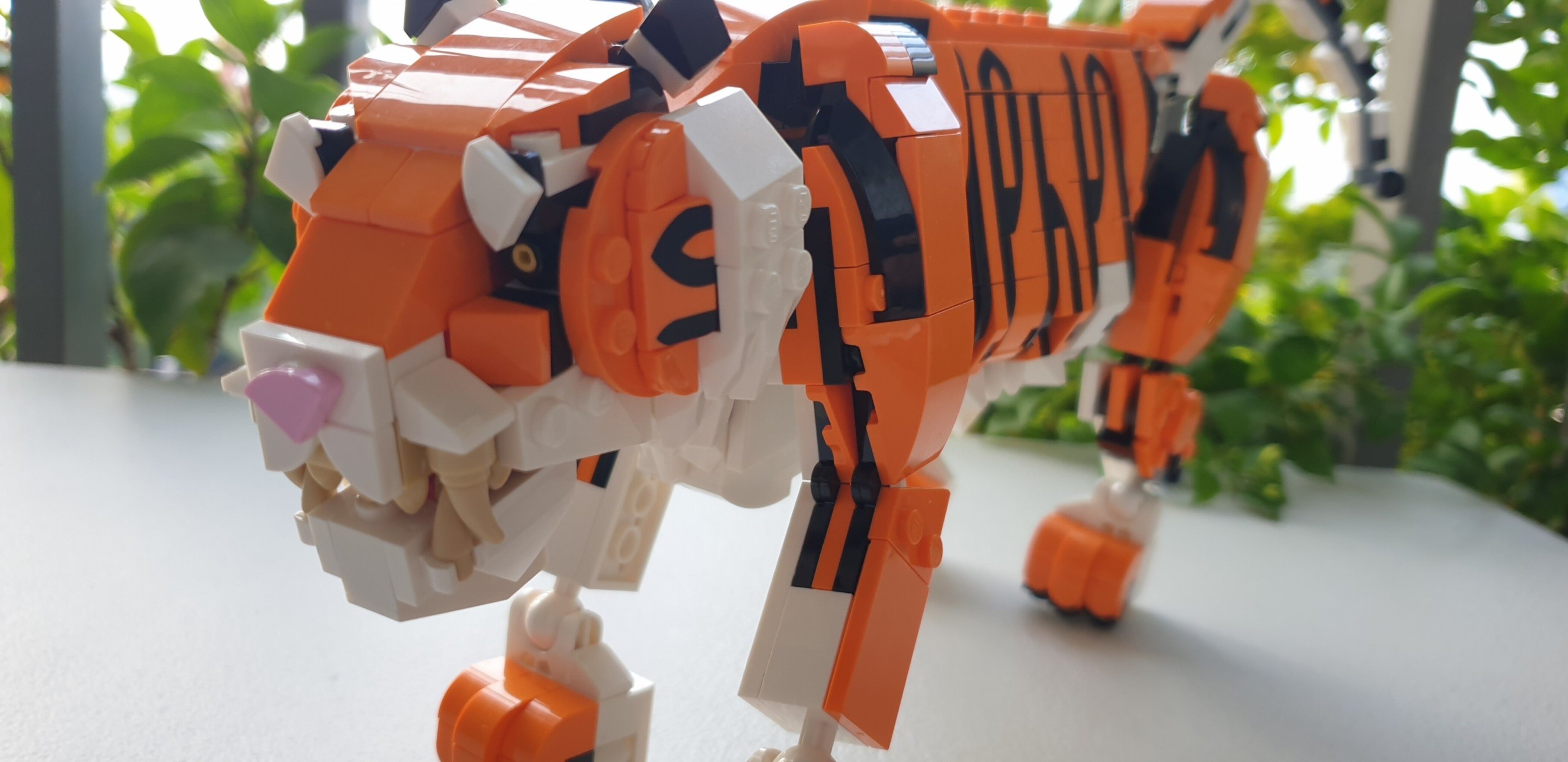 In the world of Lego, tigers roam freely amidst colorful bricks.
