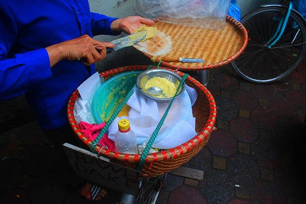 Exploring Hanoi: Enjoying Rice Flake Cakes - A Traditional Delight of ...