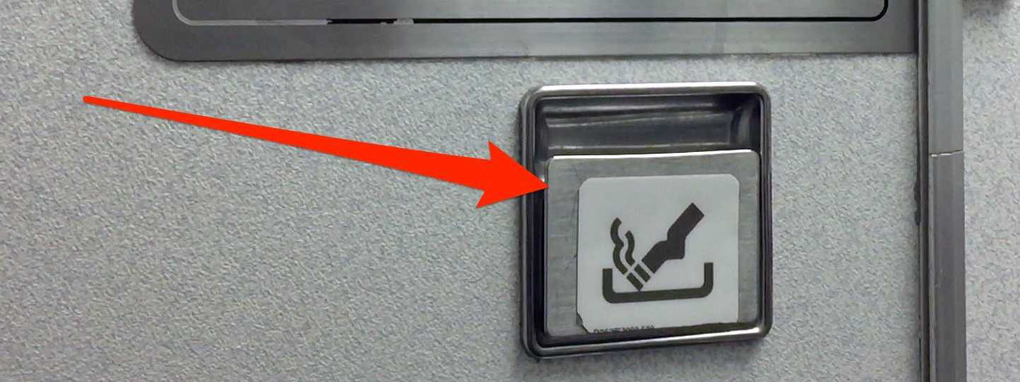 Why do airplanes still feature ashtrays in lavatories despite the ...