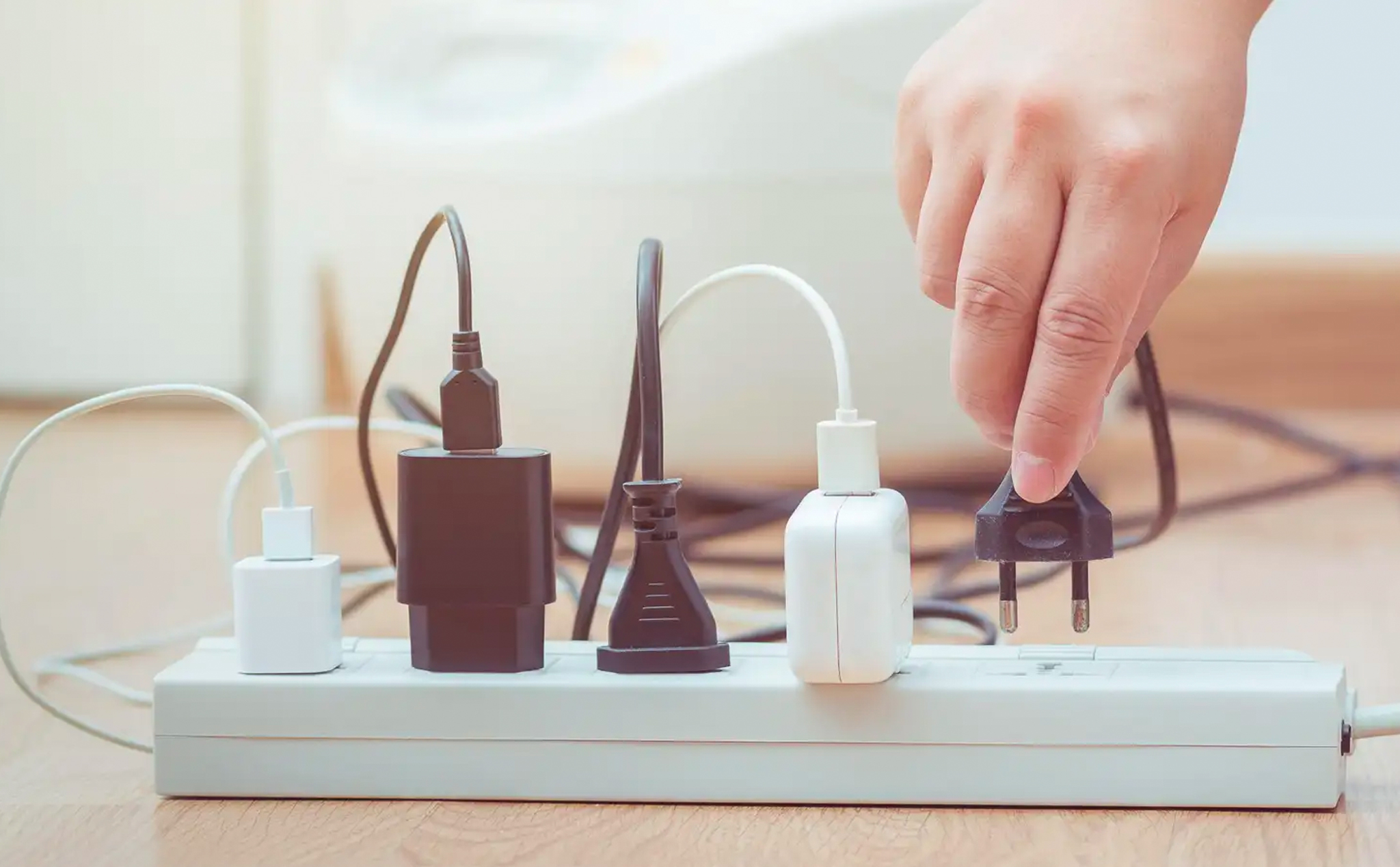 How much money can we save by unplugging unused electrical devices?