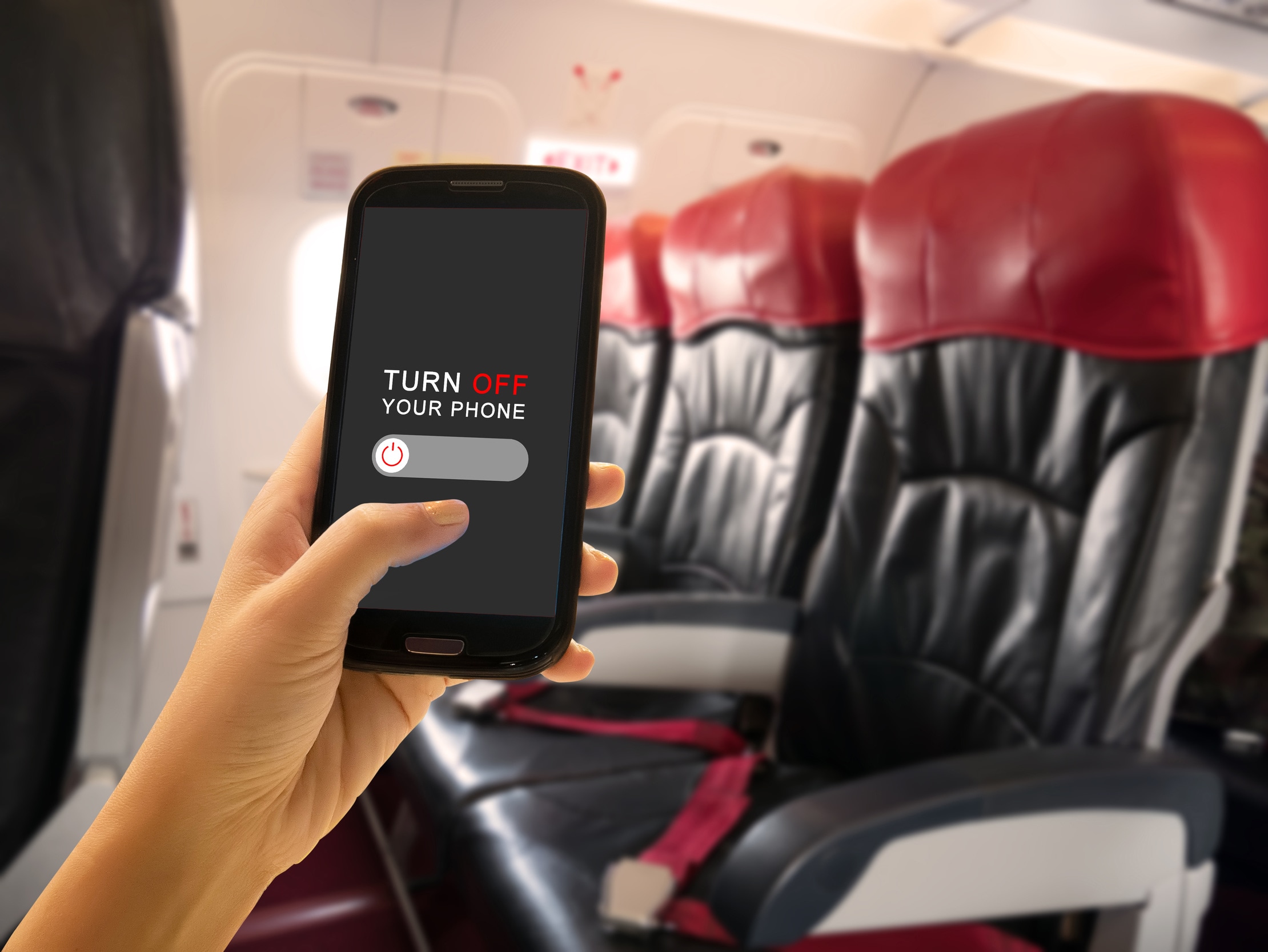 Why do you need to turn off your phone on an airplane?
