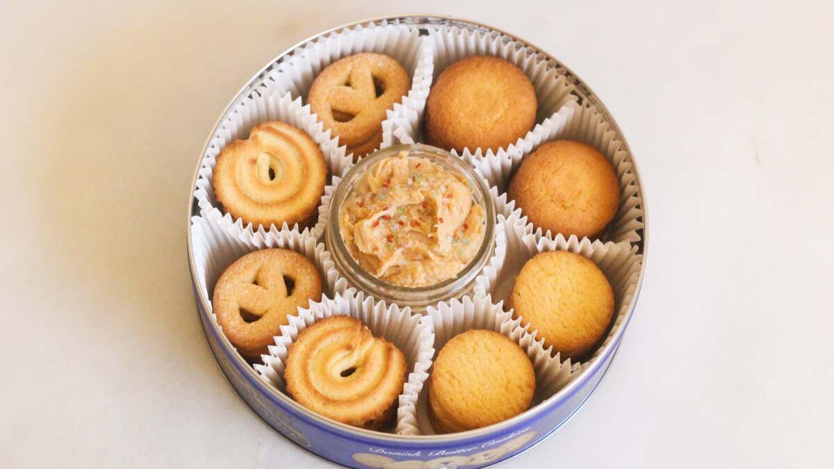 Danish butter cookies in a royal blue tin are a classic, beloved treat ...