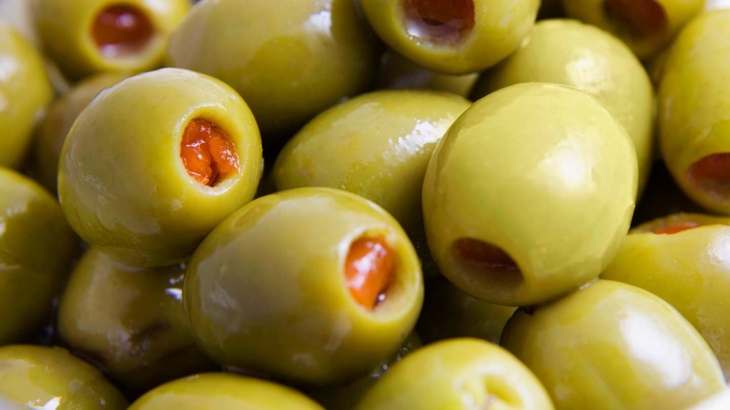 What exactly are pimentos, and how do they end up inside olives?